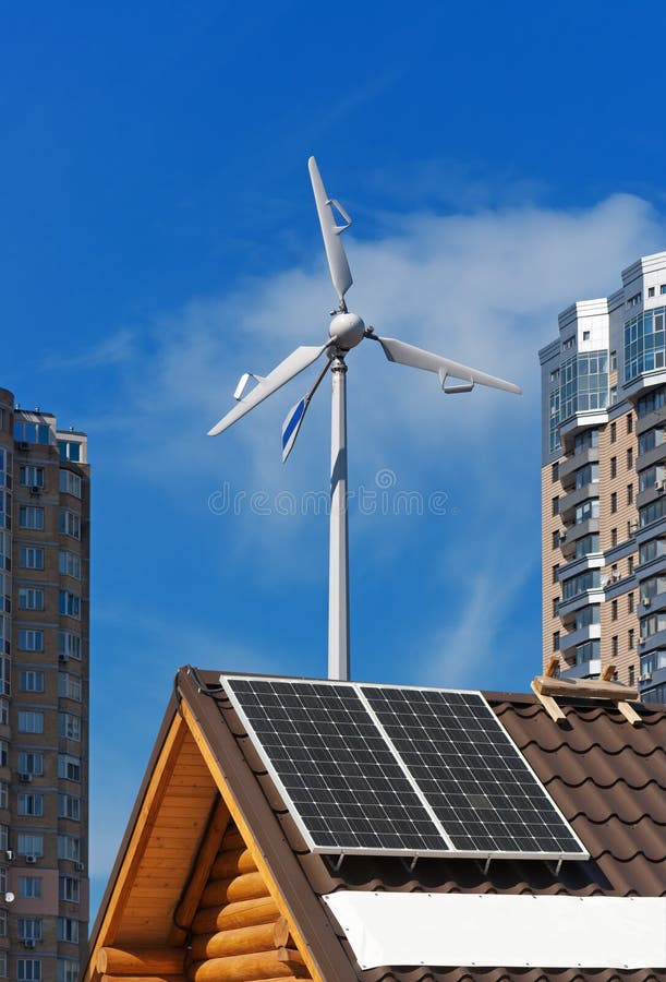 Solar and Wind Energy Generators on Wooden House. Stock Photo - Image ...