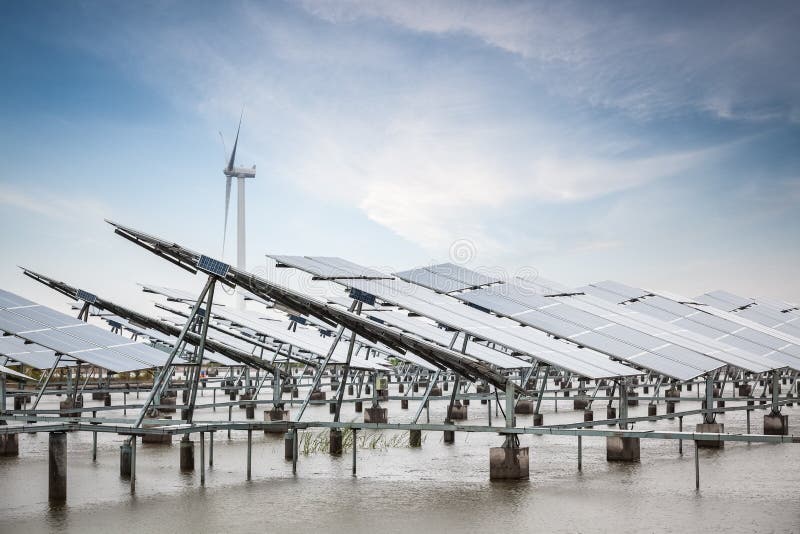 Solar and Wind Power in Coastal Mud Flat Stock Image - Image of coastal ...