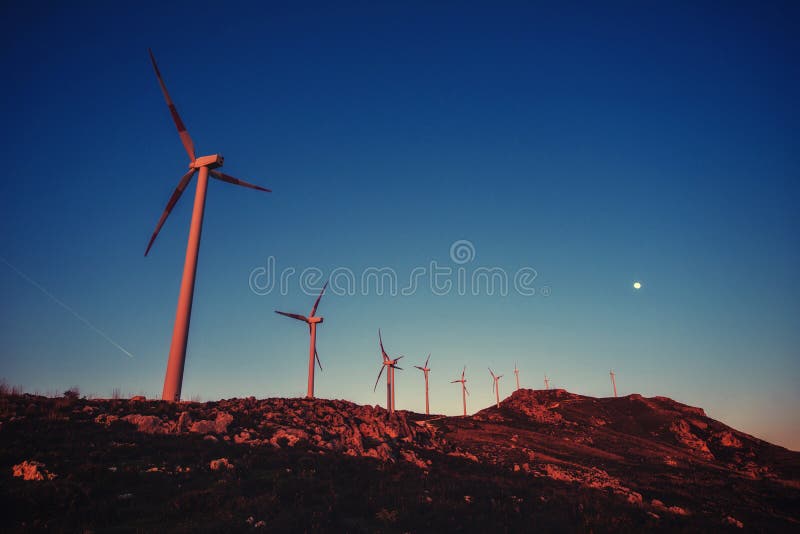 Solar Wind Turbines at Sunset. Stock Image - Image of photovoltaic ...