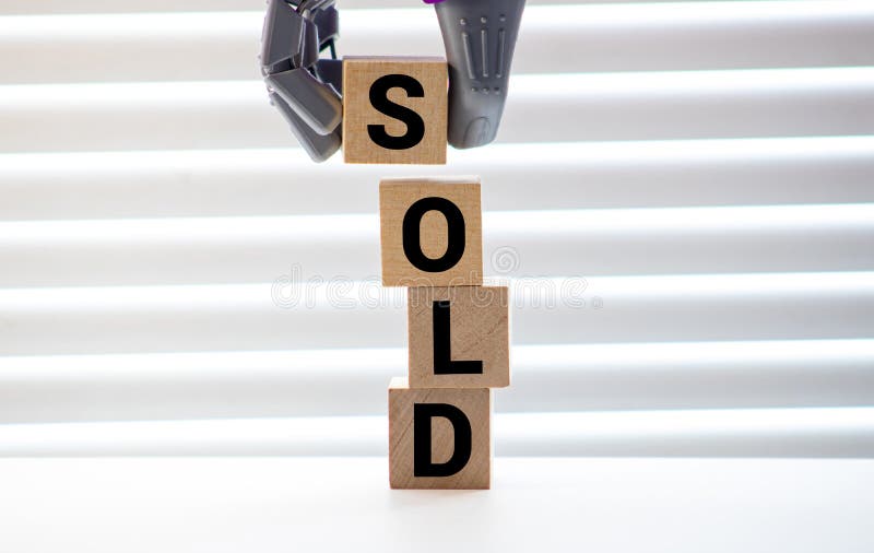 Sold Word Written In Wooden Cube Stock Photo - Image of blocks, thumbs ...