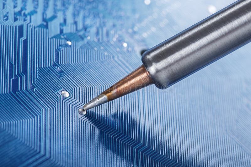 Soldering Electronic Components Onto the PCB. Electronics Repair and ...