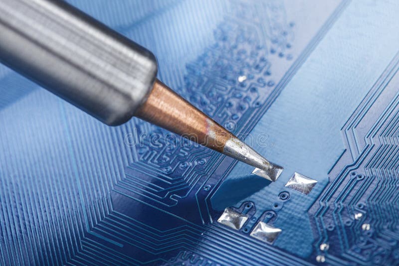 Soldering Electronic Components Onto the PCB. Electronics Repair and ...