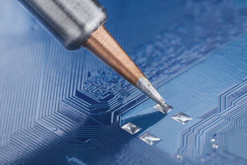 Soldering Electronic Components Onto the PCB. Electronics Repair and ...