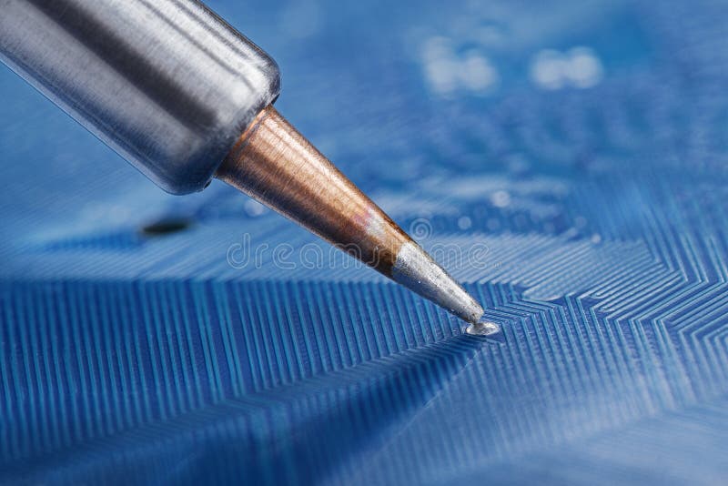 Soldering Electronic Components Onto the PCB. Electronics Repair and ...