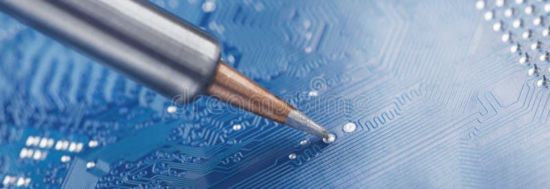 Soldering Electronic Components Onto the PCB. Electronics Repair and ...