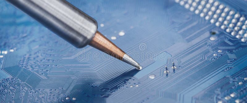 Soldering Electronic Components Onto the PCB. Electronics Repair and ...