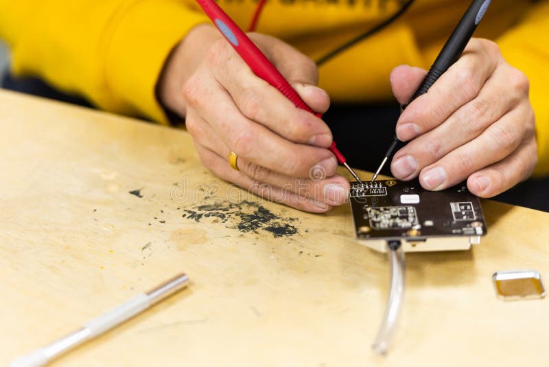 Soldering Electronics on the Table Stock Photo - Image of hand ...