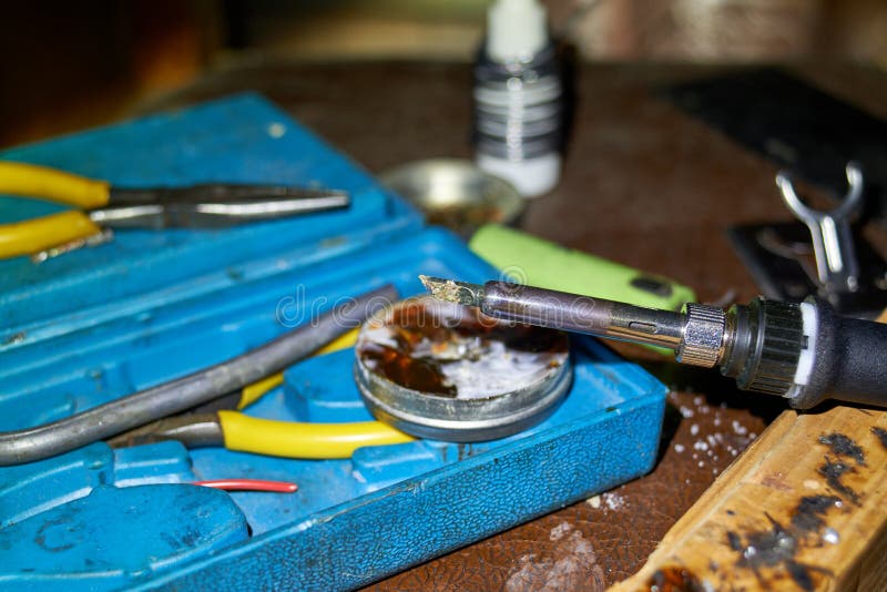 Photo of Soldering Iron, Rosin and Solder on the Box Stock Photo ...