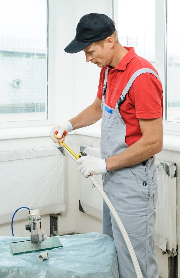 Soldering plastic pipe. stock photo. Image of heat, installation - 78887634