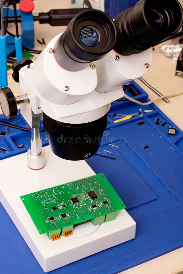 Soldering Process on a Green PCB Closeup Stock Image - Image of ...