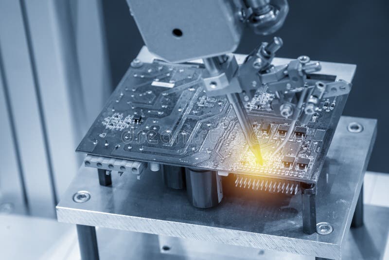 The Soldering Robot Operation with Electronic Board. Stock Image ...