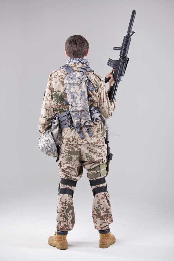 Soldier stock image. Image of back, machine, danger, holding - 25024531