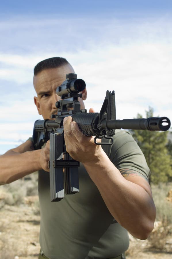 Soldier Aiming Machine Gun stock photo. Image of brave - 29659820
