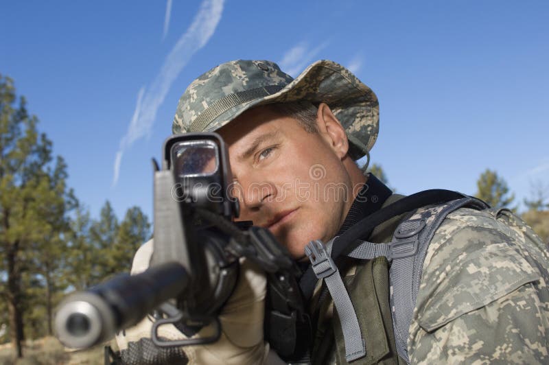 Soldier aiming his rifle stock photo. Image of america - 9881706