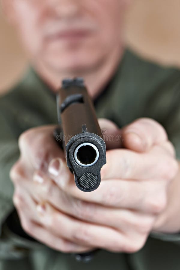 Soldier Aiming a Pistol Colt Stock Photo - Image of holding, closeup ...