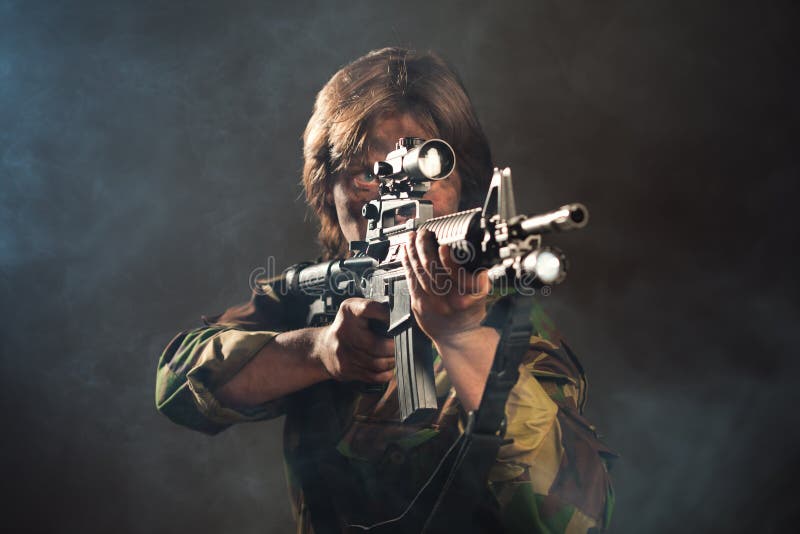 Soldier aiming a weapon stock image. Image of battle - 16597615