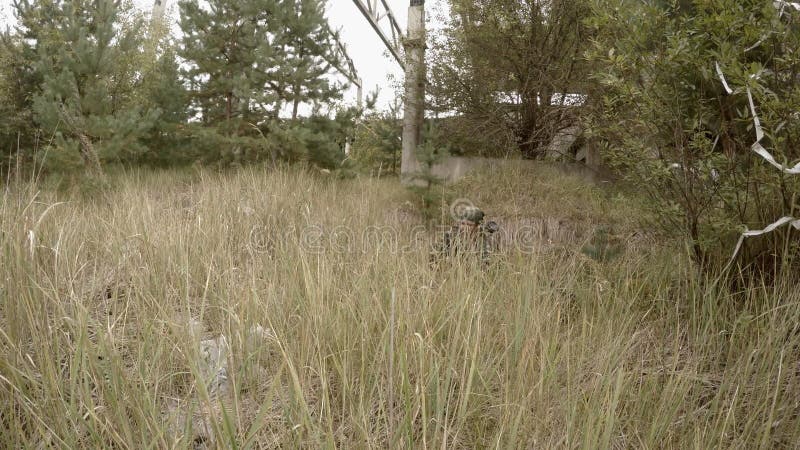 Soldier Aims from the Machine Gun in Grass Stock Footage - Video of ...