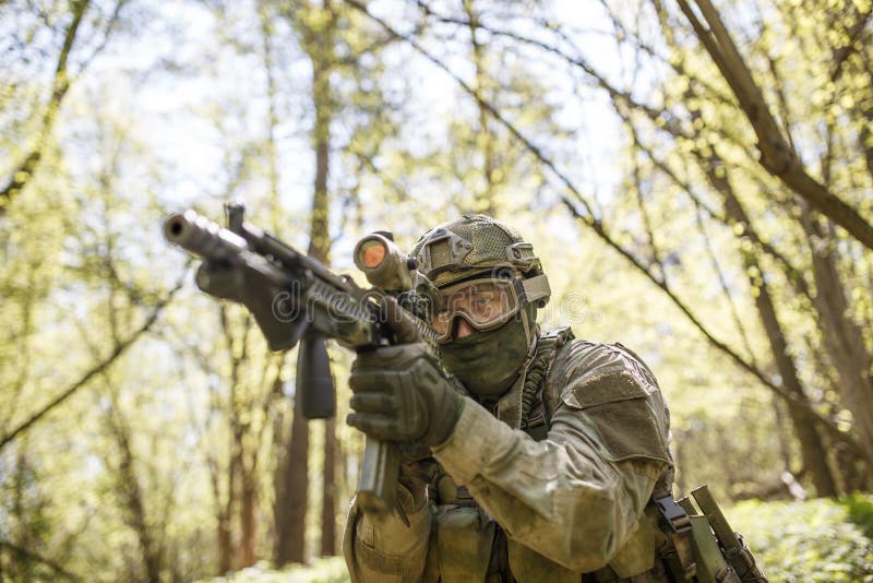 Soldier on Assignment in Woods Stock Photo - Image of hand ...