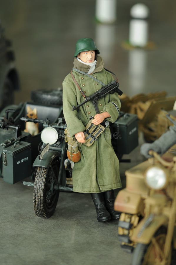 Soldier with Automatic Gun Standing in Front of Army Motorcycle Stock ...