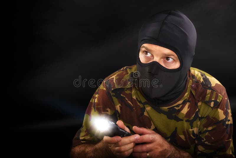 Soldier on a Black Background with a Flashlight Stock Image - Image of ...