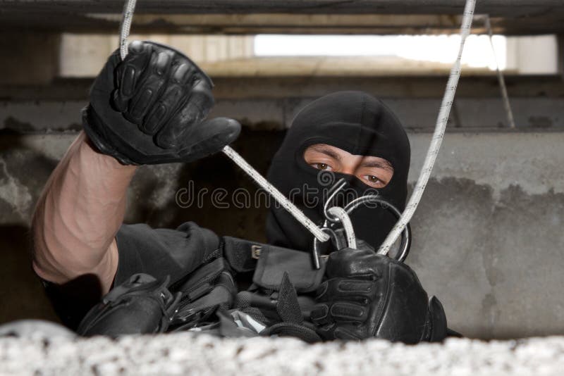 Soldier in Black Uniform with Rifle Stock Image - Image of gunner, male ...