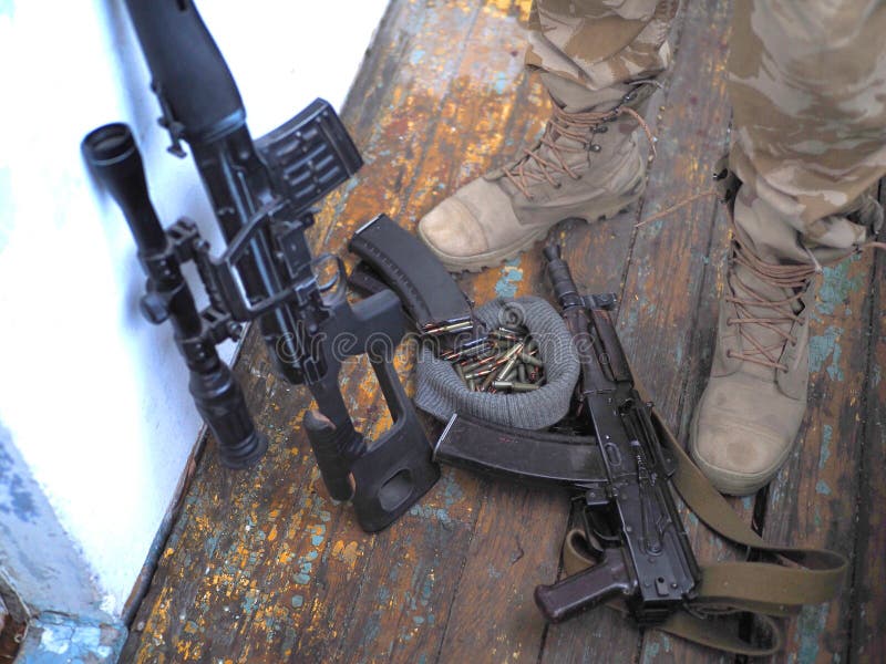 Soldier Boots, Sniper Rifle and Handgun Close Up. War Stock Image ...