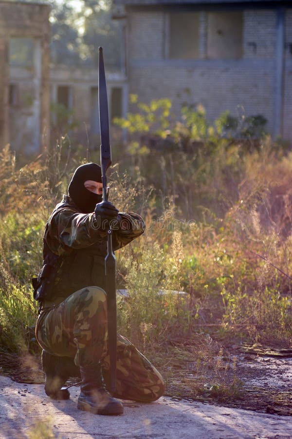 Soldier with bow and arrow stock photo. Image of nature - 62654952