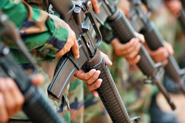 Soldier carrying gun stock image. Image of training, operation - 21978637