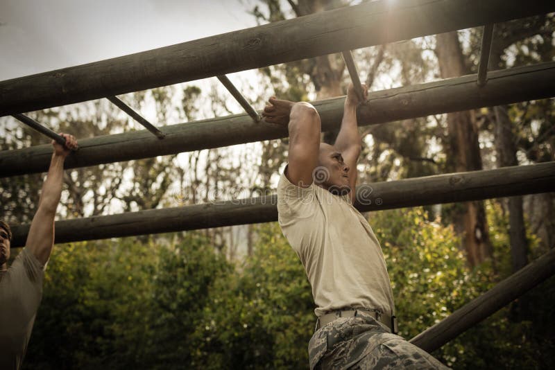 Soldier Climbing Monkey Bars Stock Photo - Image of bars, healthy: 88465588