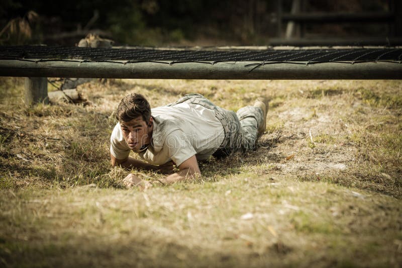 Fit People Crawling Under the Net during Obstacle Course Stock Image ...