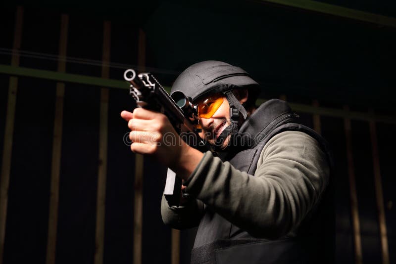 The Soldier Fires a Rifle at the Shooting Range Stock Photo - Image of ...