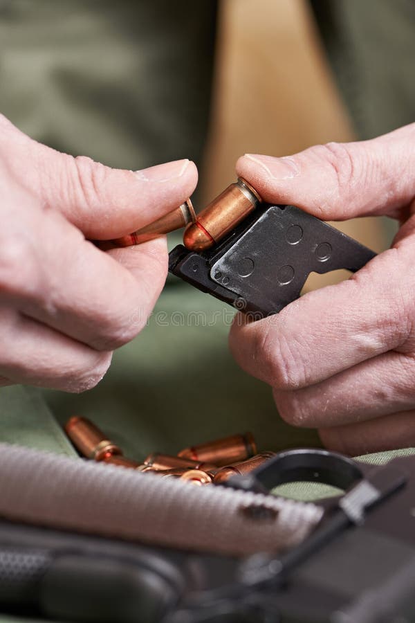 Soldier Load Ammo in Clip Colt Stock Image - Image of dangerous, clip ...