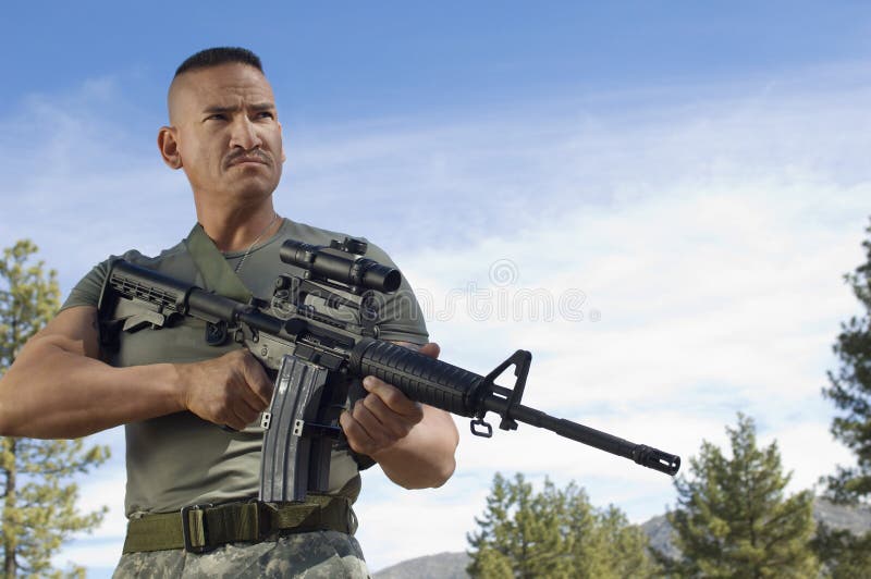 Soldier with Machine Gun stock photo. Image of patriotic - 29659794