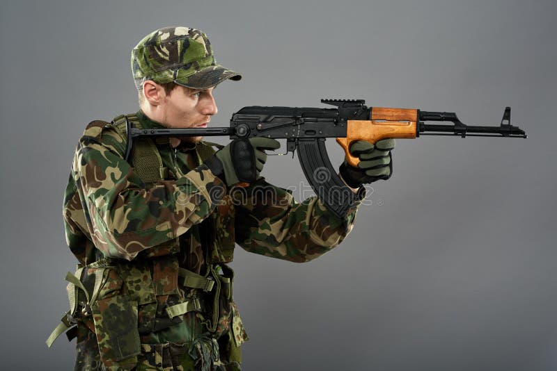 Soldier with Machine Gun Aiming Stock Image - Image of danger, armor ...