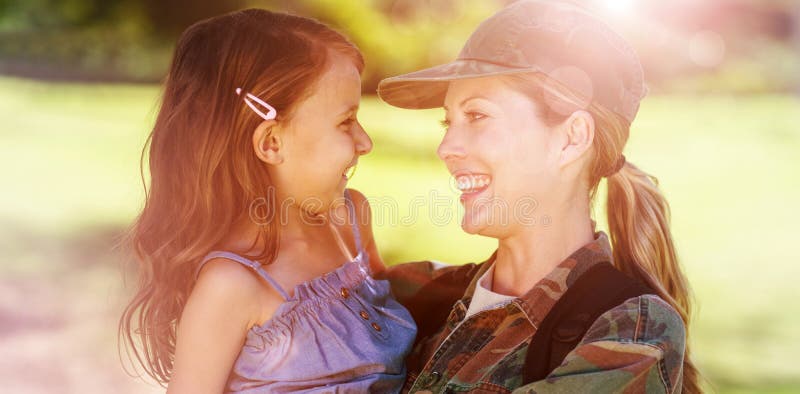 A Soldier Mother Hugging Her Daughter Stock Photo - Image of family ...