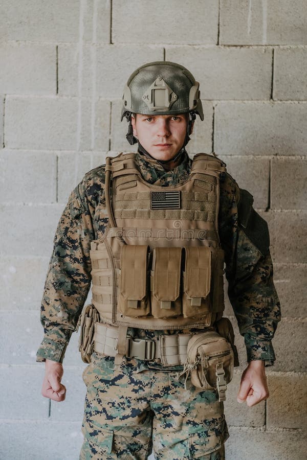 Soldier Preparing Tactical Protective and Communication Gear for Action ...