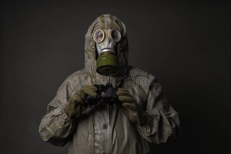 Soldier in a Protective Suit with a Gas Mask Stock Image - Image of ...