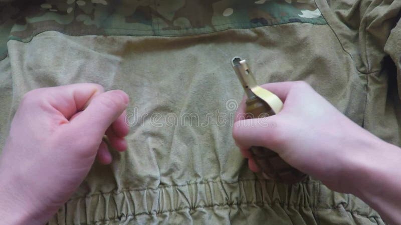 The Soldier Pulls Out the Safety Ring of a Hand Grenade Stock Video ...