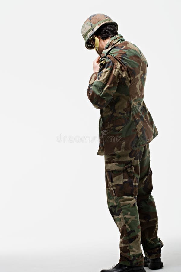 Soldier putting on helmet stock image. Image of american - 62558315