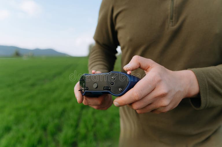A Soldier Remote Controls a Drone. Control Panel in Hand Stock Image ...