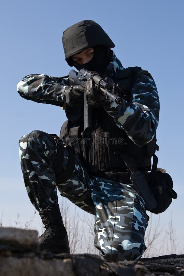 Special Forces Soldier Is Aiming And Shooting On The Target Stock Photo ...