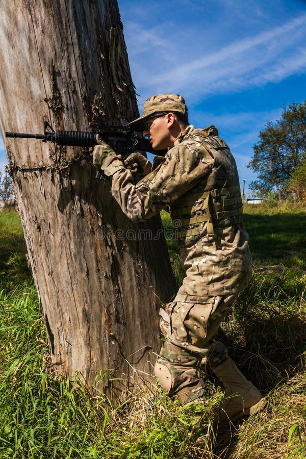 Soldier with a rifle stock photo. Image of nature, army - 39541668