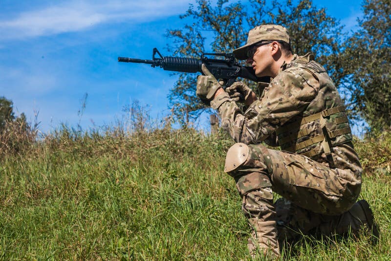 Soldier with a rifle stock photo. Image of camouflage - 39541734