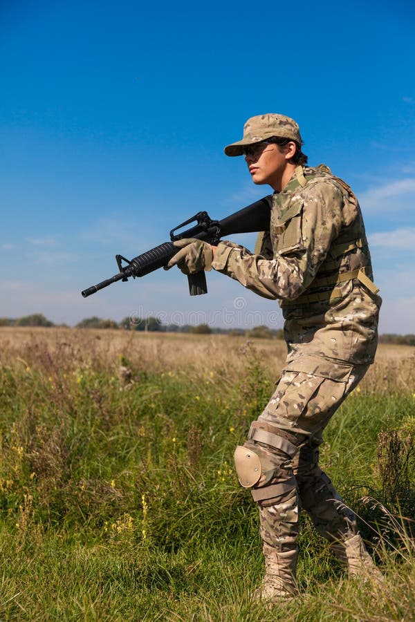 Soldier with a rifle stock photo. Image of camouflage - 39541762