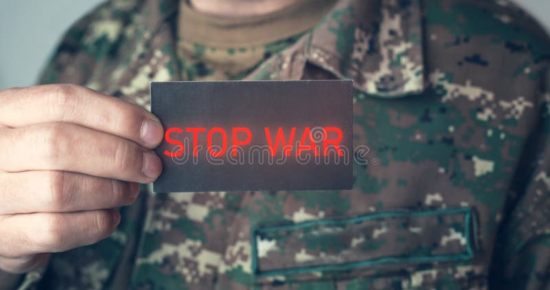 Soldier Showing Stop War on Cardboard Card Stock Image - Image of ...
