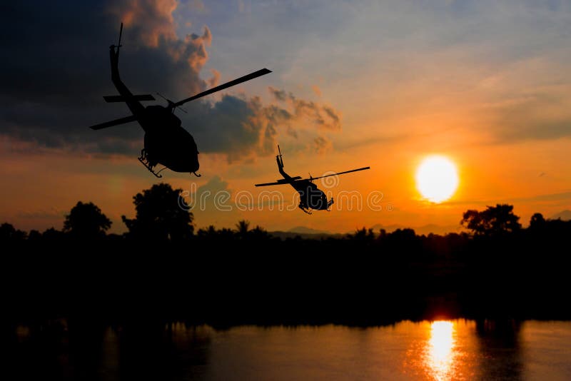 Soldier Silhouette in Rappelling Climb Down from Helicopter on Sunset ...