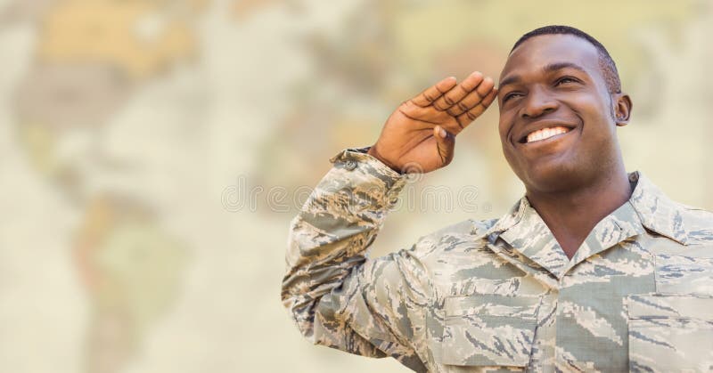 Soldier Smiling and Saluting Against Blurry Yellowish Map Stock Photo ...