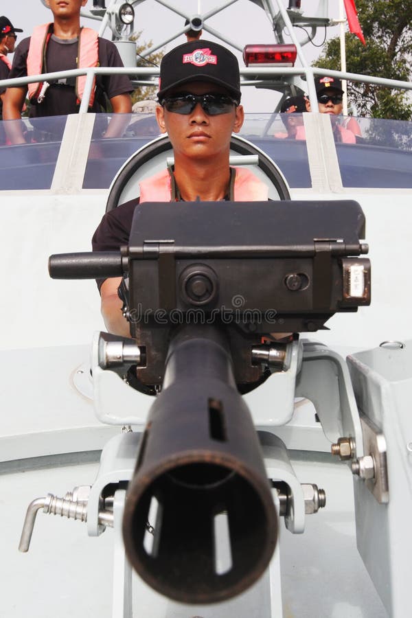 Soldier in the speed boat editorial photography. Image of military ...