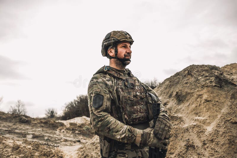 A Soldier Standing in a Dig-position Stock Photo - Image of warrior ...