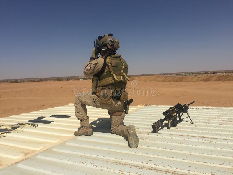 Soldier Stands on Top of a Building, Gazing into the Distance Editorial ...